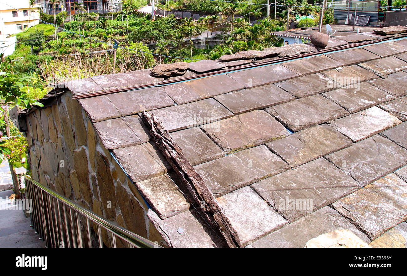 The slate roof of traditional house built by the aborigines in Taiwan ...