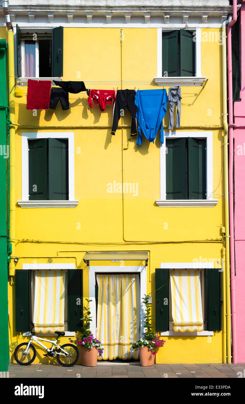 Bright yellow color house in Burano, Venice Stock Photo - Alamy