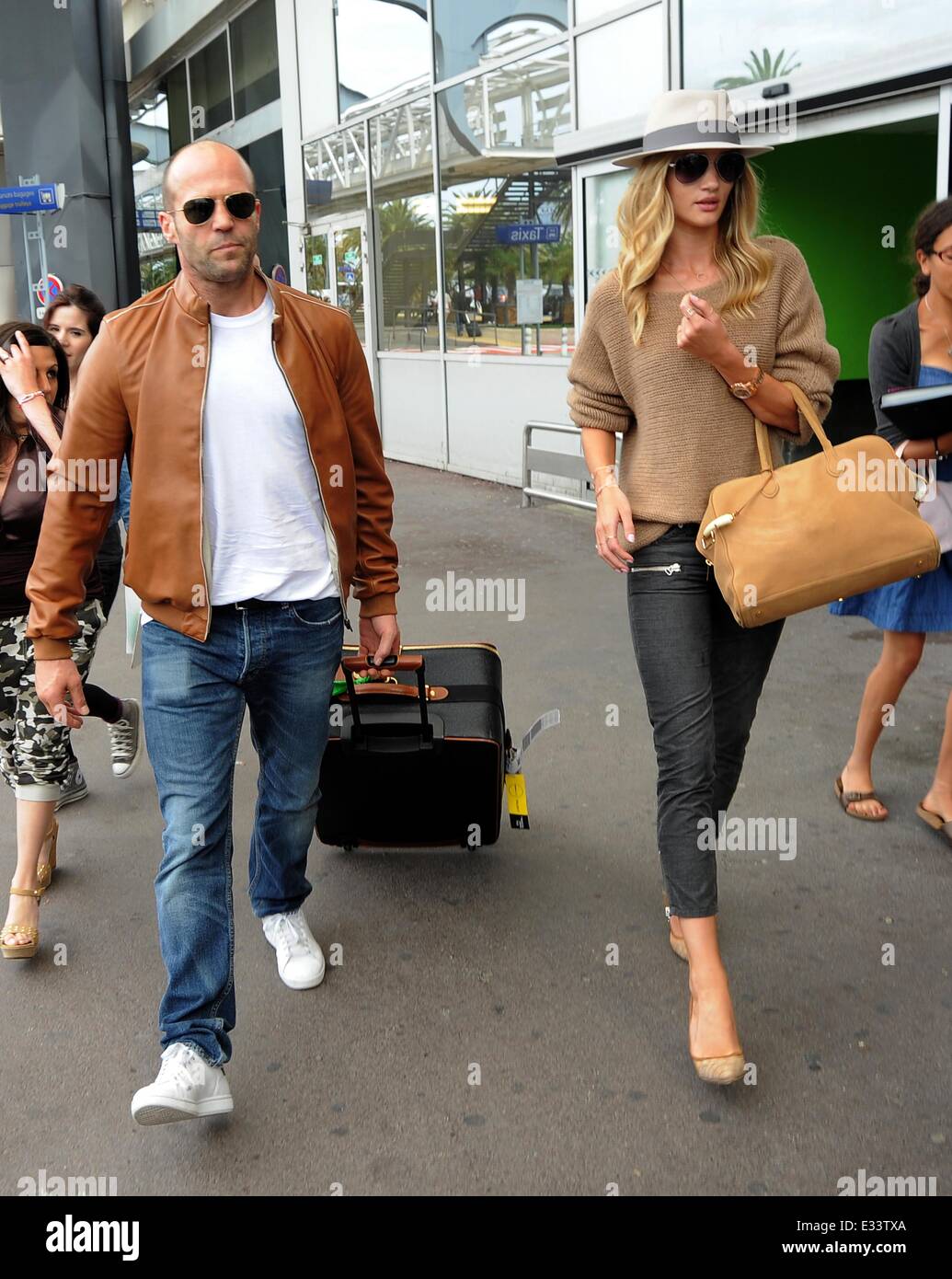 Jason Statham and girlfriend Rosie Huntington-Whiteley arrive at Nice ...