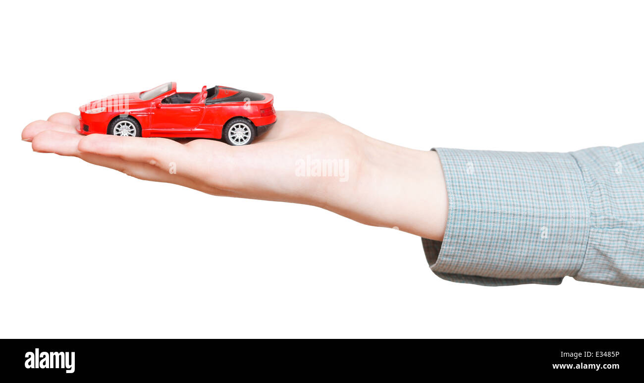 new red car on hand isolated on white background Stock Photo - Alamy