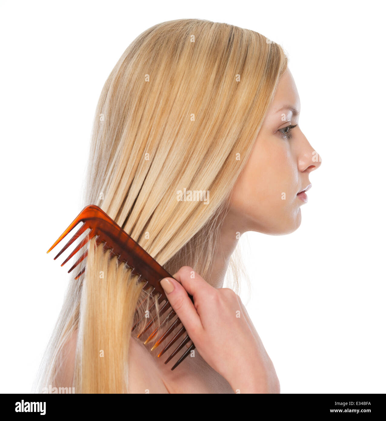 Teen combing hair hi-res stock photography and images - Alamy