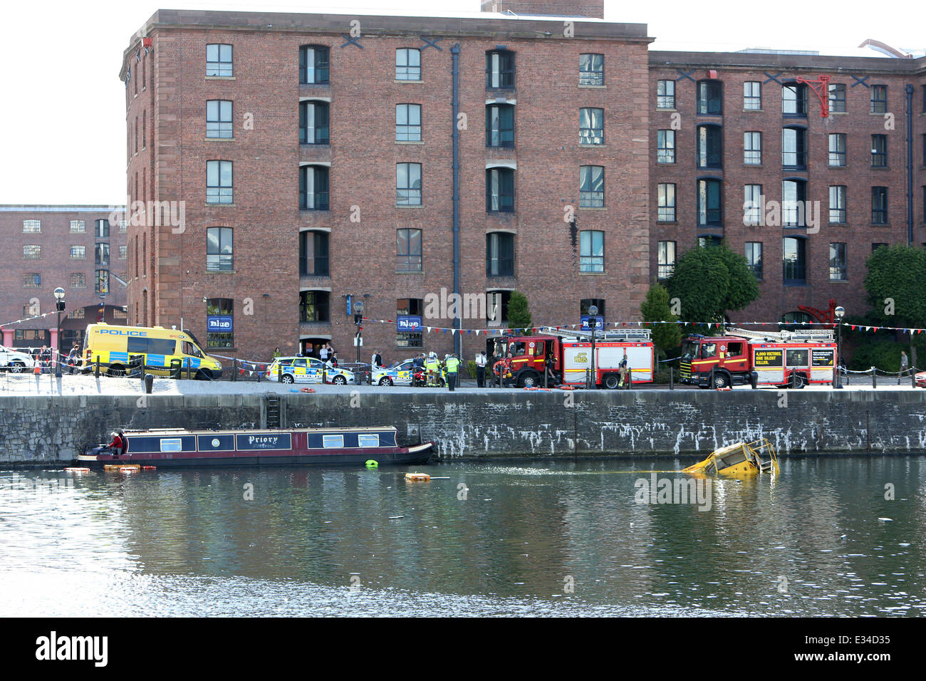 A Duck Marine amphibious tour bus sinks in the Albert Dock in Liverpool ...