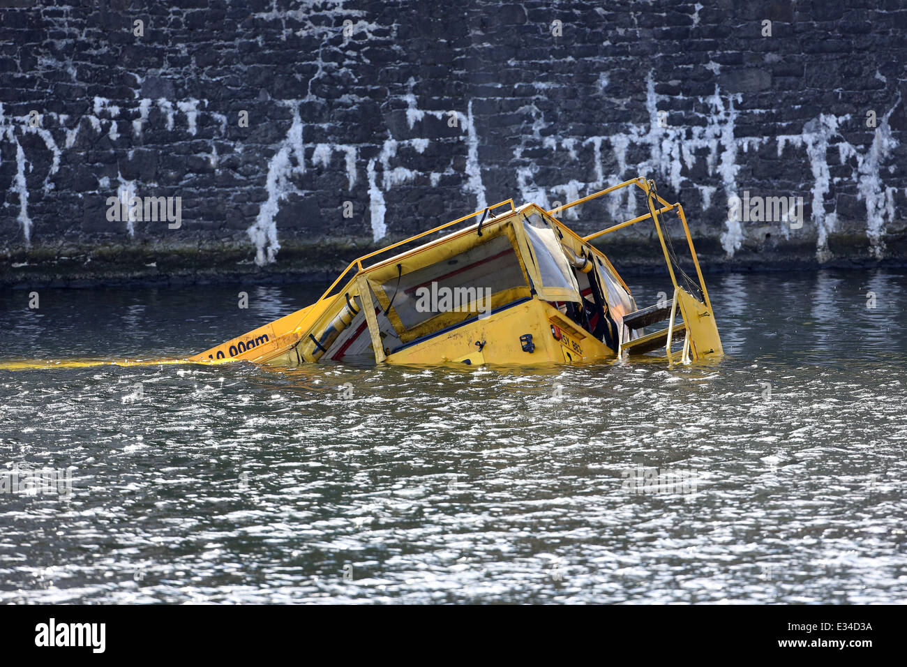 A Duck Marine amphibious tour bus sinks in the Albert Dock in Liverpool ...