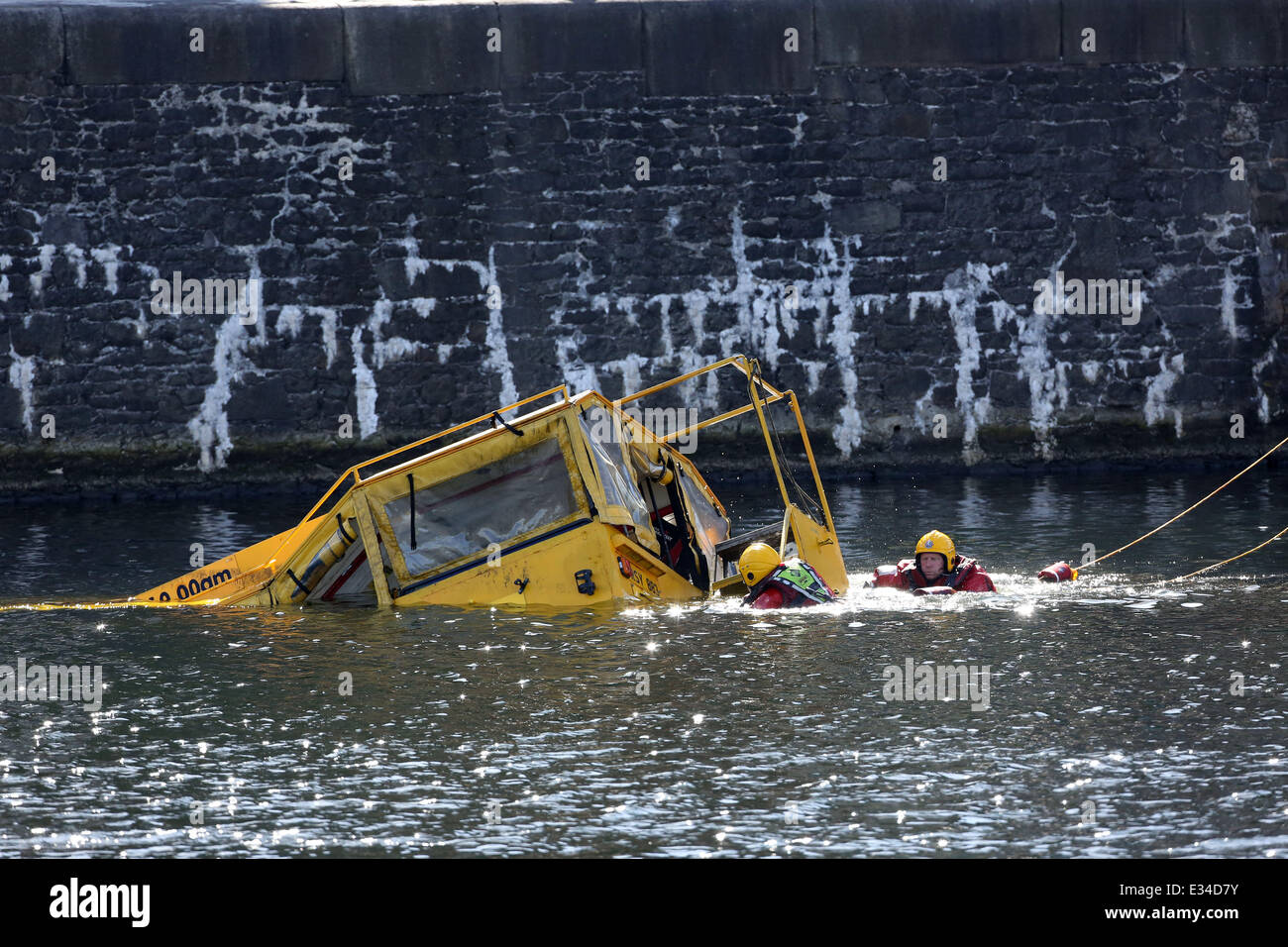 A Duck Marine amphibious tour bus sinks in the Albert Dock in Liverpool ...