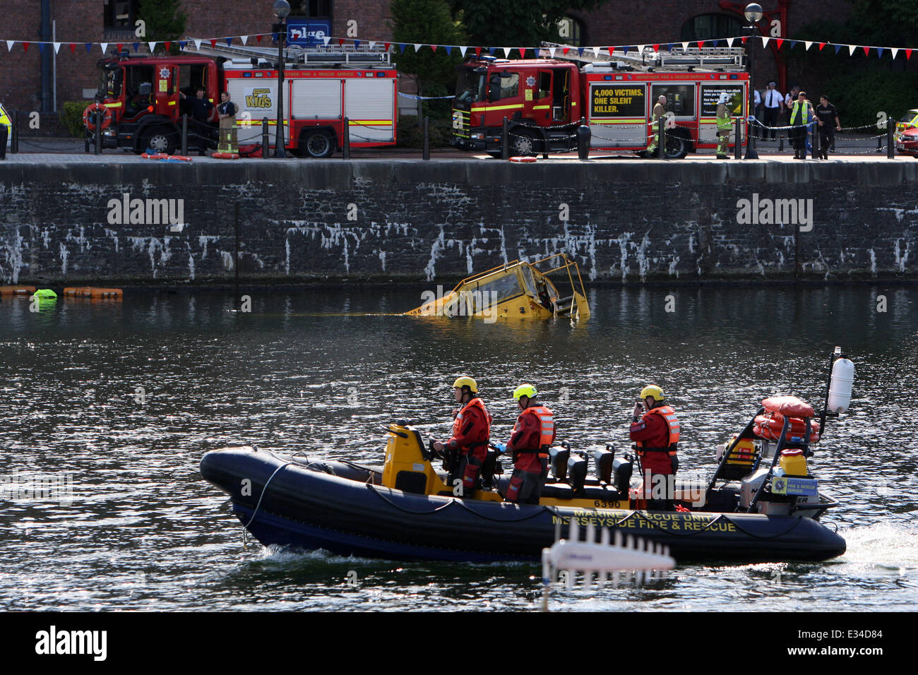 A Duck Marine amphibious tour bus sinks in the Albert Dock in Liverpool ...