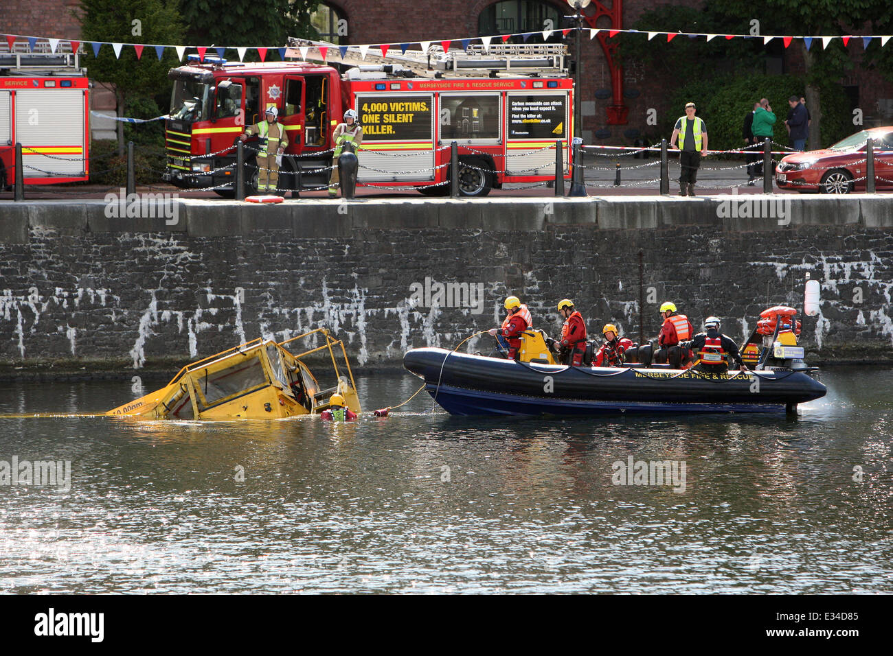 A Duck Marine amphibious tour bus sinks in the Albert Dock in Liverpool ...