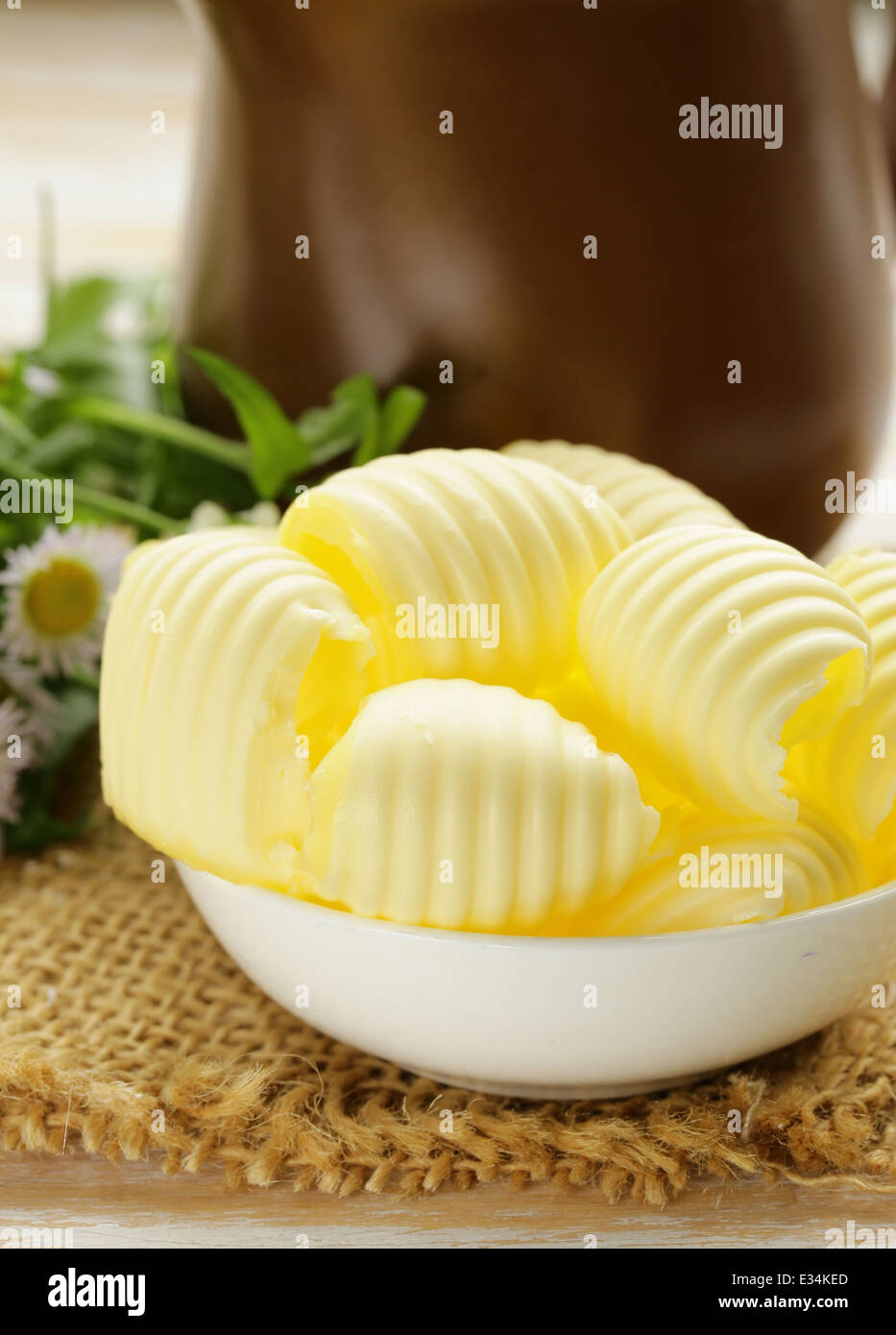 fresh yellow dairy butter in a white bowl Stock Photo - Alamy