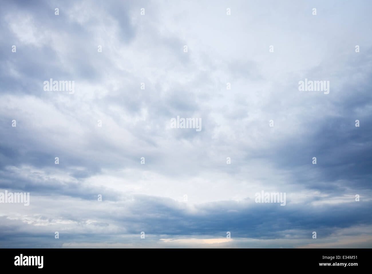 grey blue clouds in evening sky in summer Stock Photo - Alamy