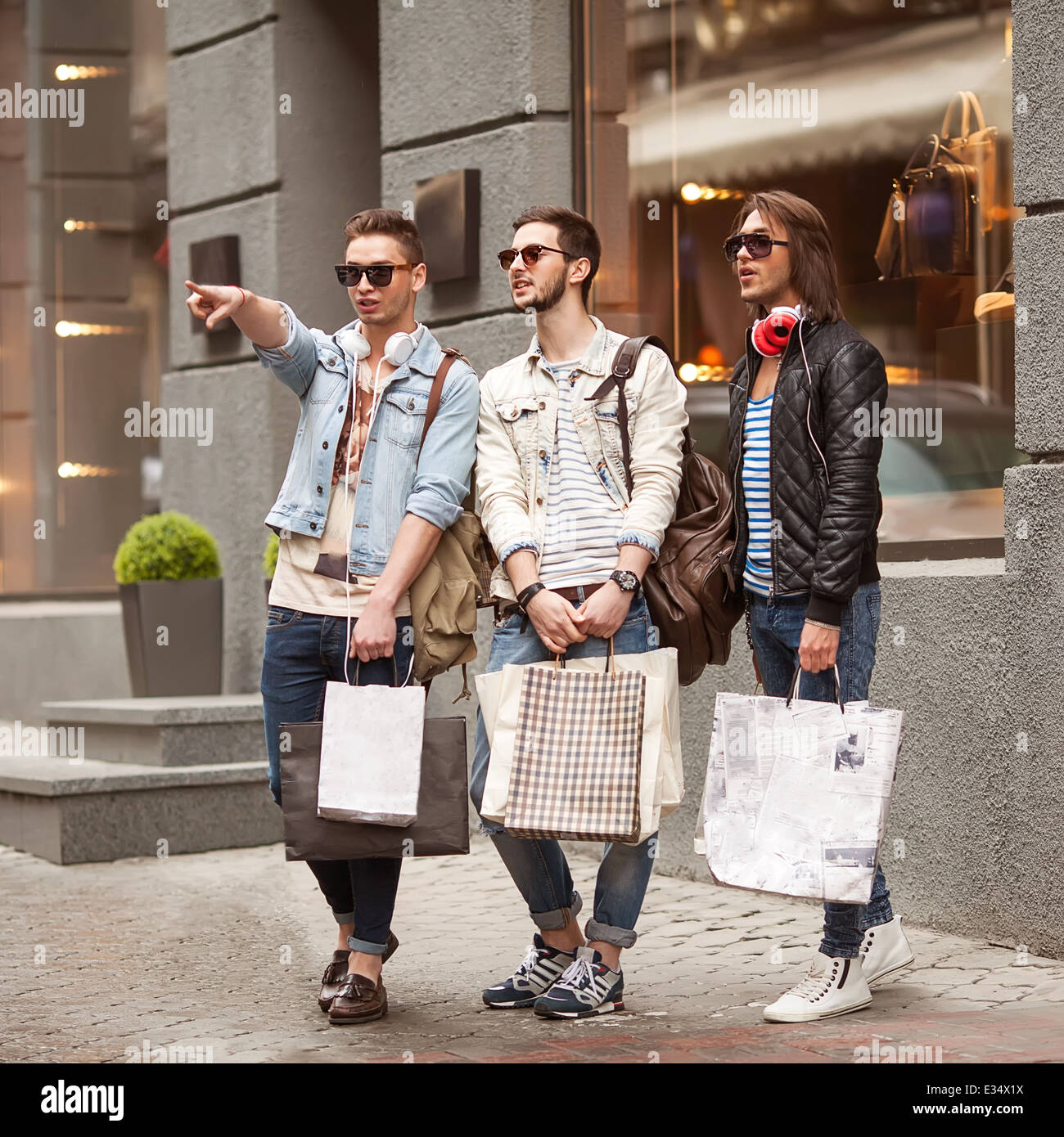 Three Young male fashion metraseksualy shop shopping walk Stock Photo ...