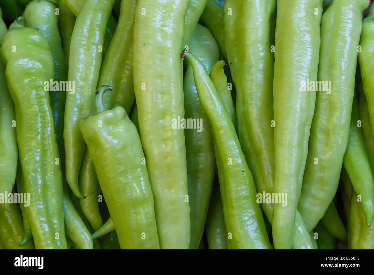Green peppers close up as a background Stock Photo - Alamy