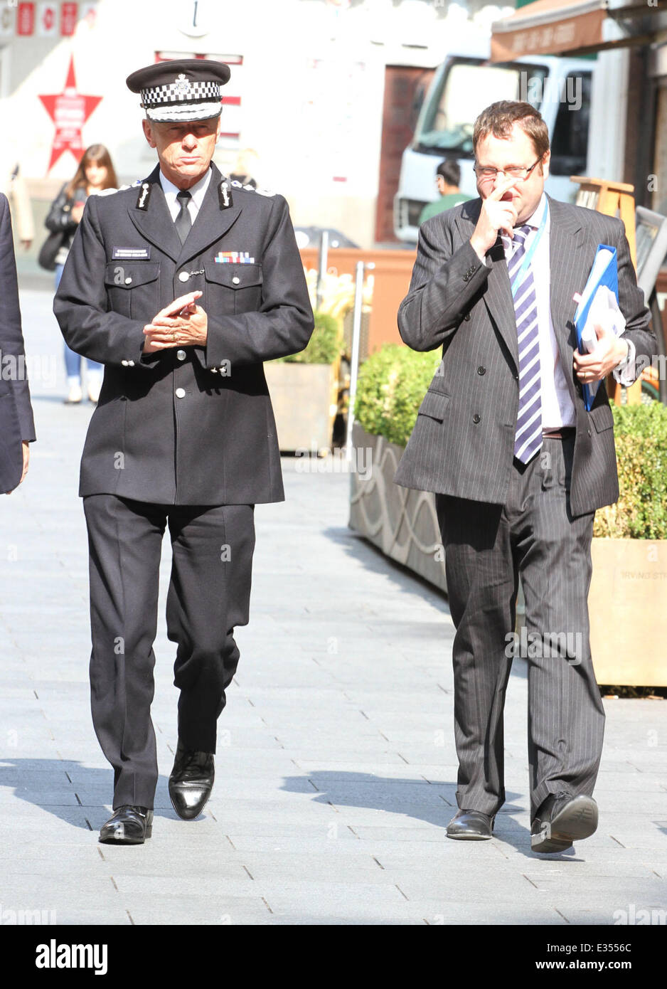 Met chief Sir Bernard Hogan-Howe leaving the LBC Radio in Westminster ...