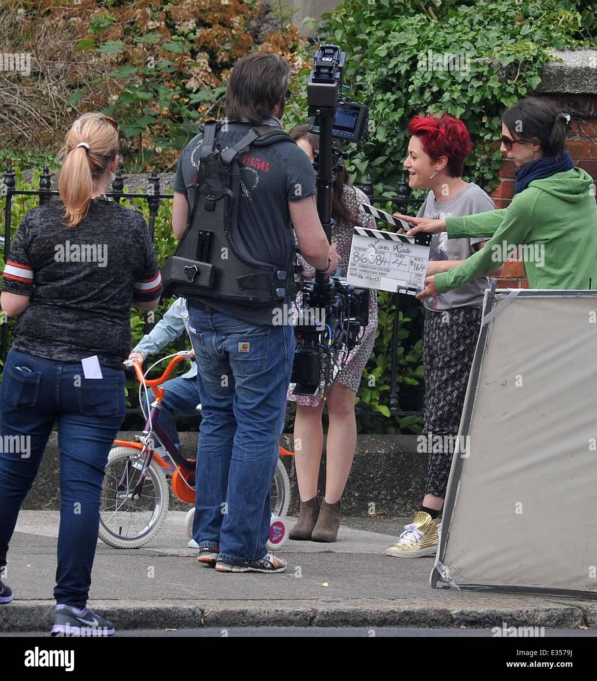 Actress' Lily Collins and Jamie Winstone, with bright red dyed hair, on ...