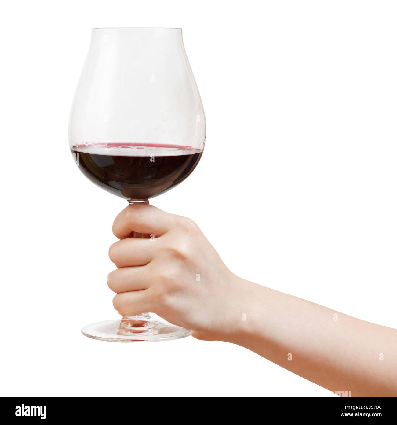 hand holds goblet glass with red wine isolated on white background ...