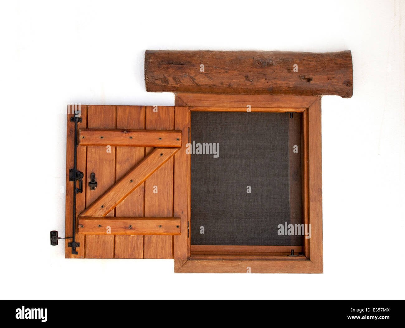 close up of a Spanish window with the shutter open showing a fly screen ...