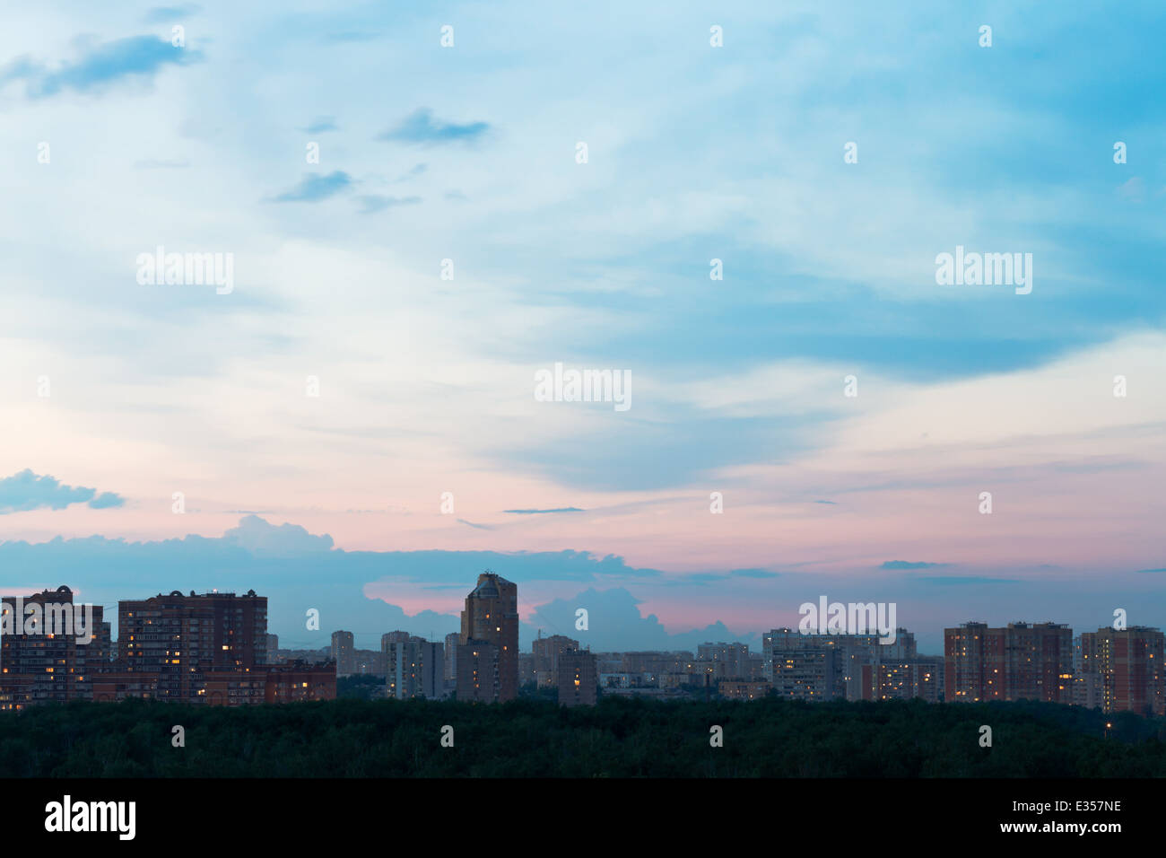 durk blue and pink dusk sky over urban street in summer evening Stock ...