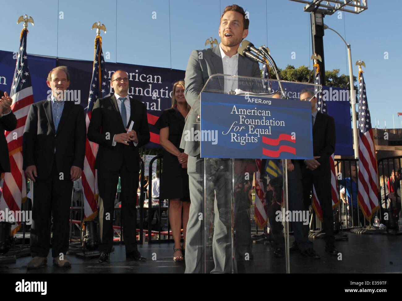 People attend a rally in West Hollywood to celebrate the U.S. Supreme ...