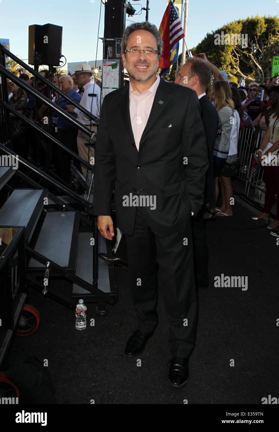 People attend a rally in West Hollywood to celebrate the U.S. Supreme ...