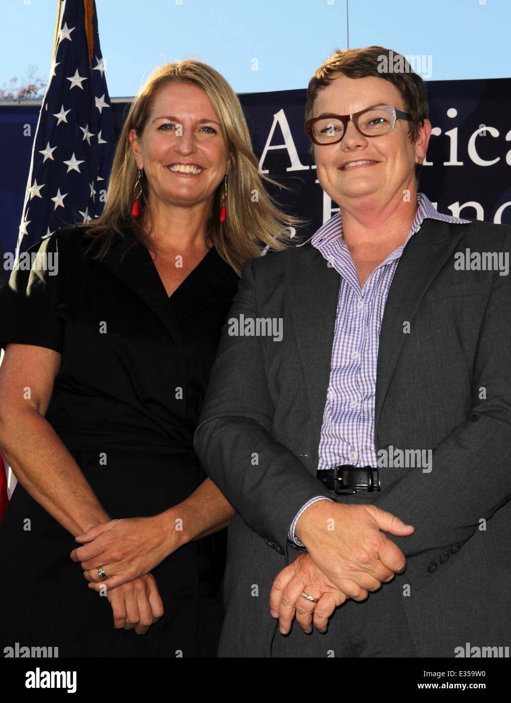 People attend a rally in West Hollywood to celebrate the U.S. Supreme ...