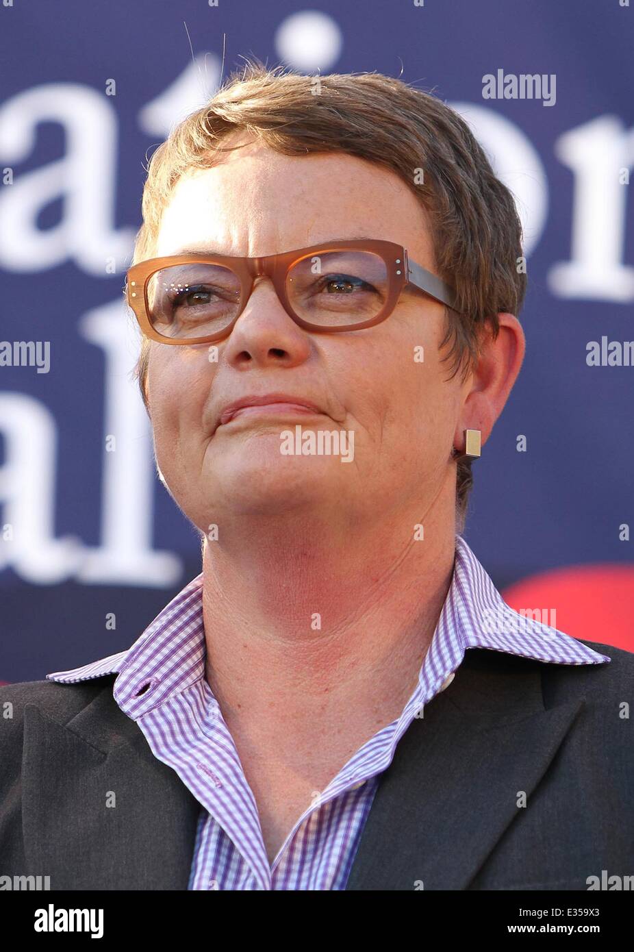 People attend a rally in West Hollywood to celebrate the U.S. Supreme ...