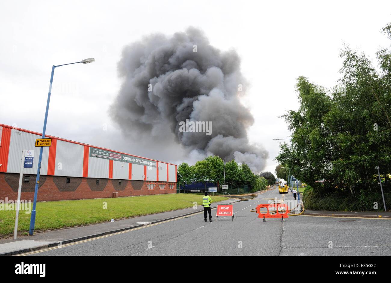Firefighters at the scene of a blaze at a plastic recycling factory in ...