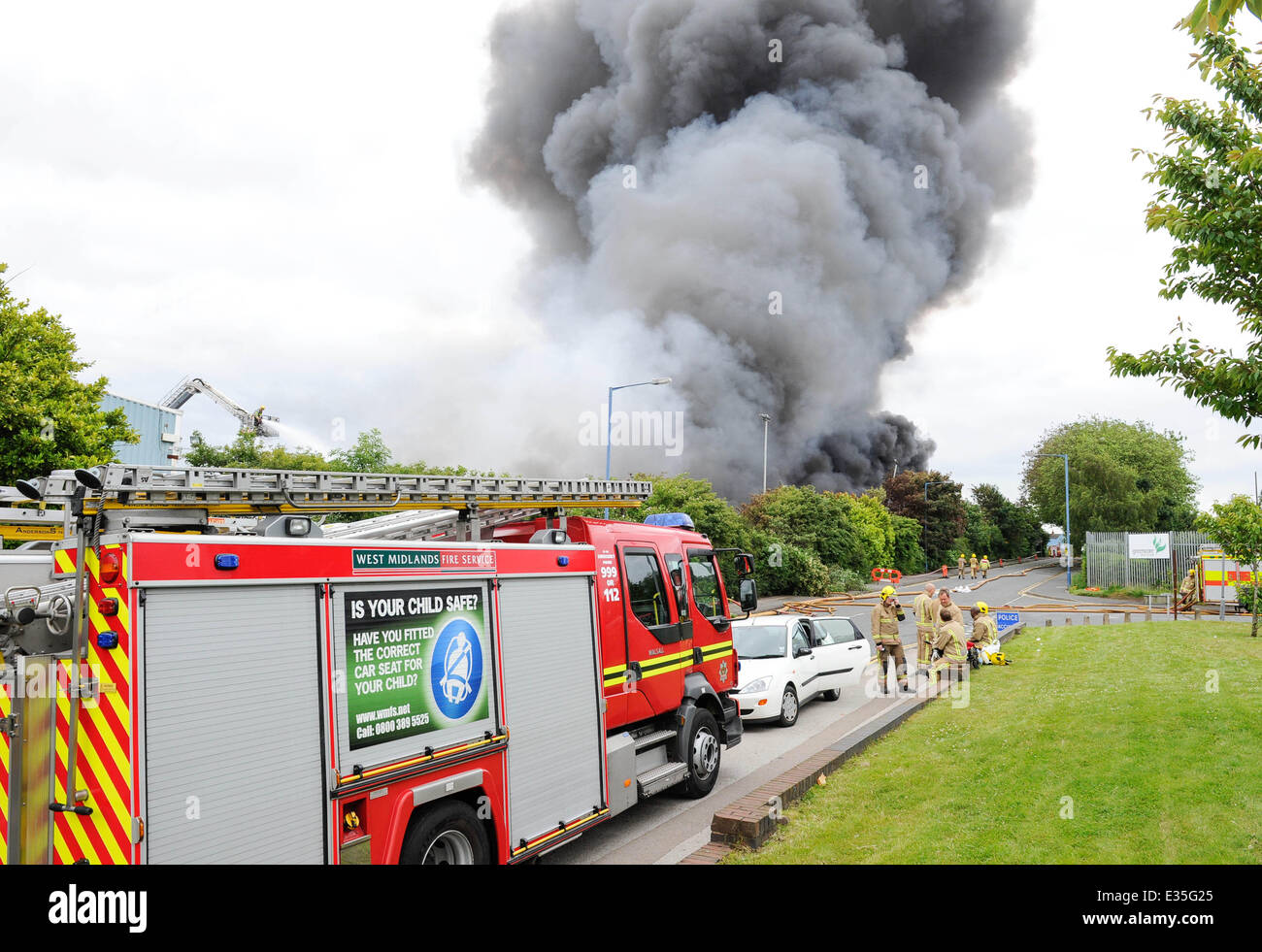 Firefighters at the scene of a blaze at a plastic recycling factory in ...