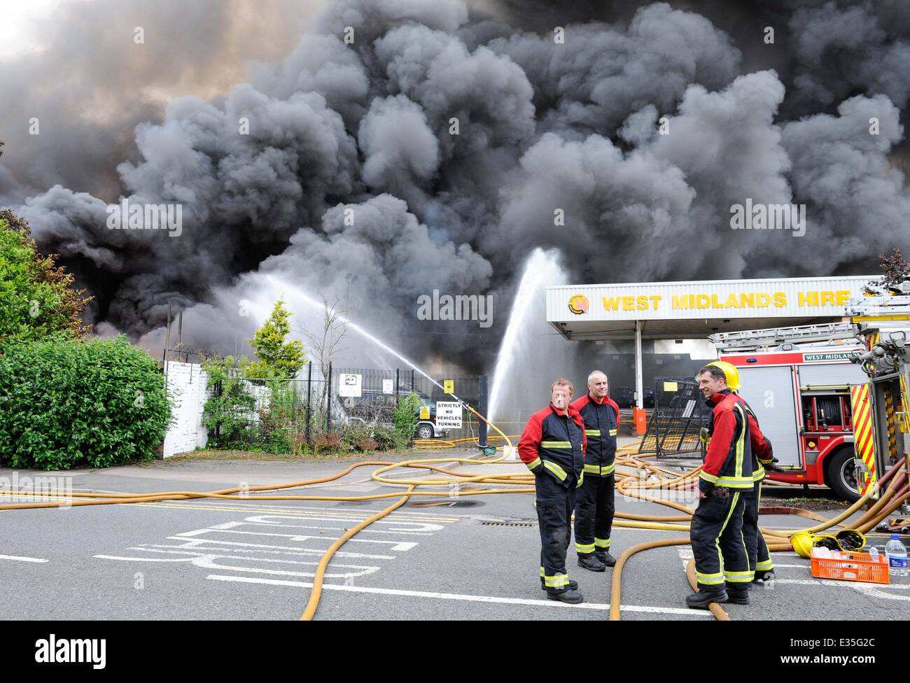 Firefighters at the scene of a blaze at a plastic recycling factory in ...