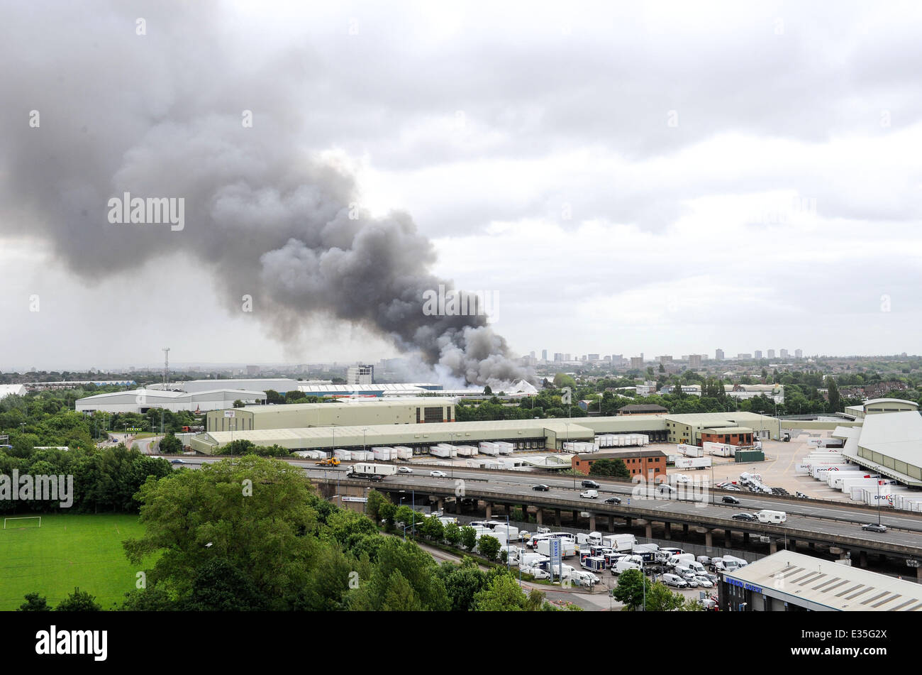 Firefighters at the scene of a blaze at a plastic recycling factory in ...