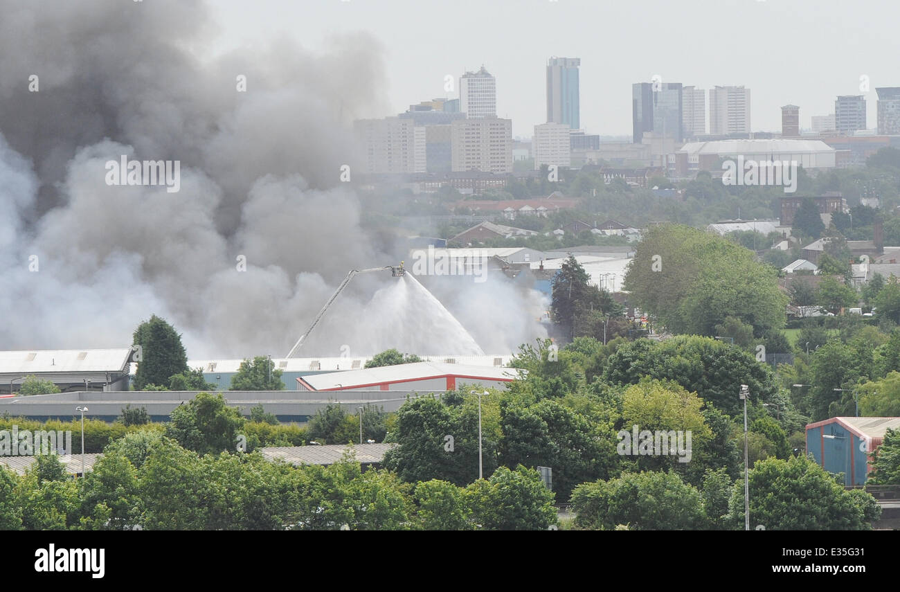 Firefighters at the scene of a blaze at a plastic recycling factory in ...