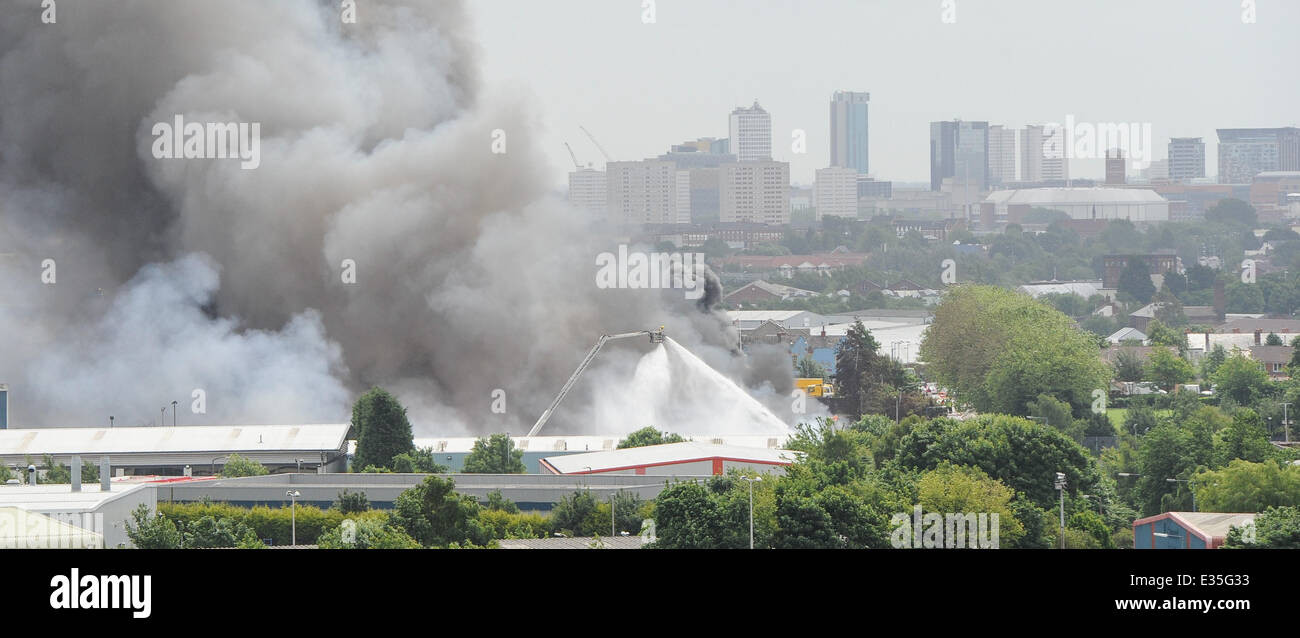 Firefighters at the scene of a blaze at a plastic recycling factory in ...
