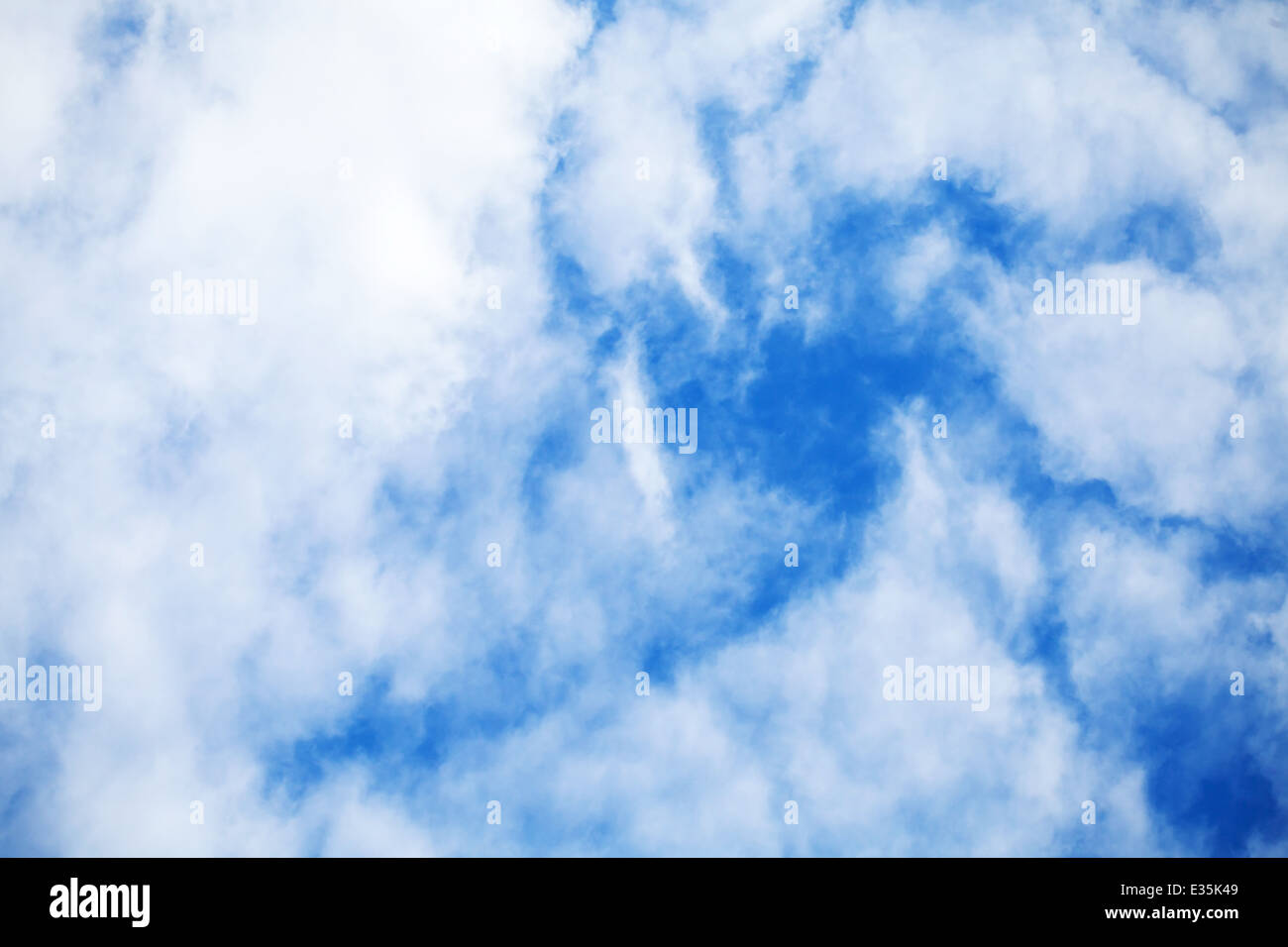 Natural blue cloudy sky background photo texture Stock Photo - Alamy