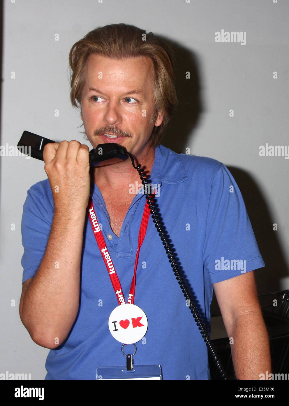 David Spade works as a Kmart clerk for charity to promote 'Grown Ups 2 ...