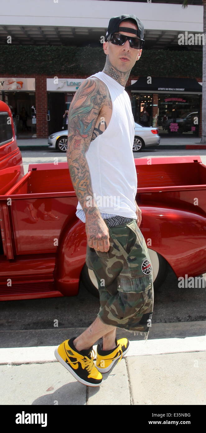 Travis Barker and his daughter Alabama Luella Barker stop for a cold ...