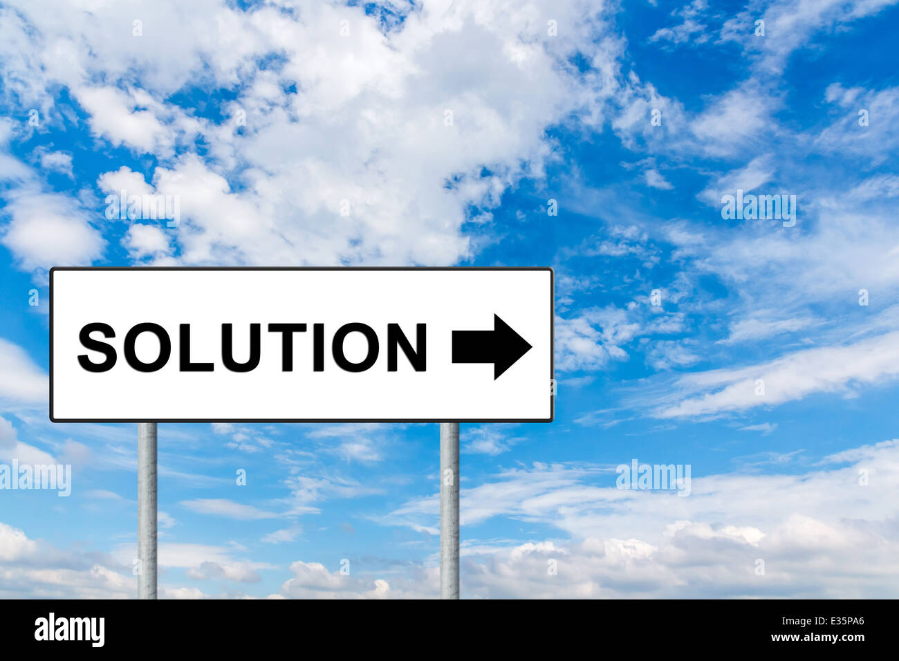solution on white road sign with blue sky Stock Photo - Alamy