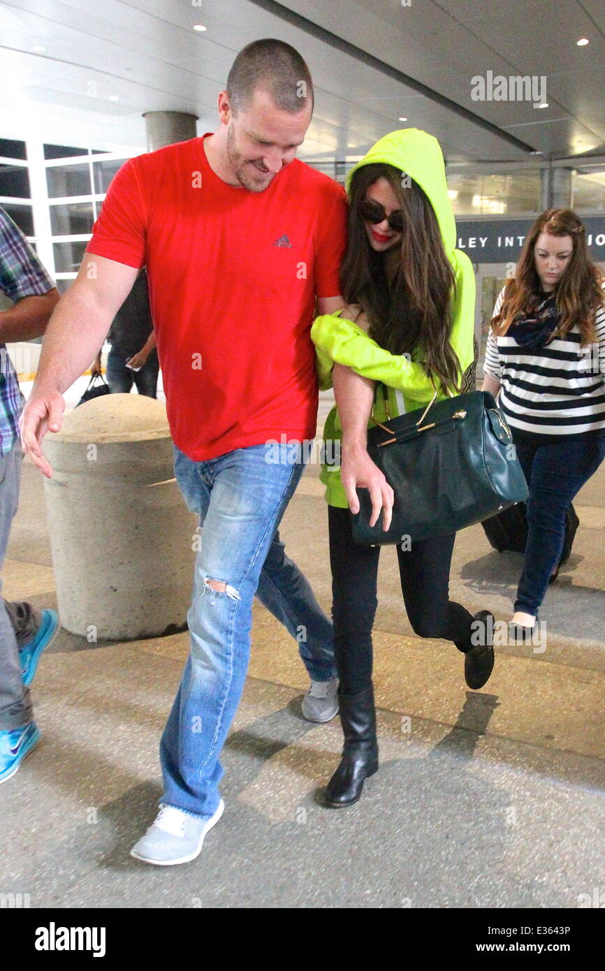 Selena Gomez arrives at LAX Airport on a flight in from Europe ...