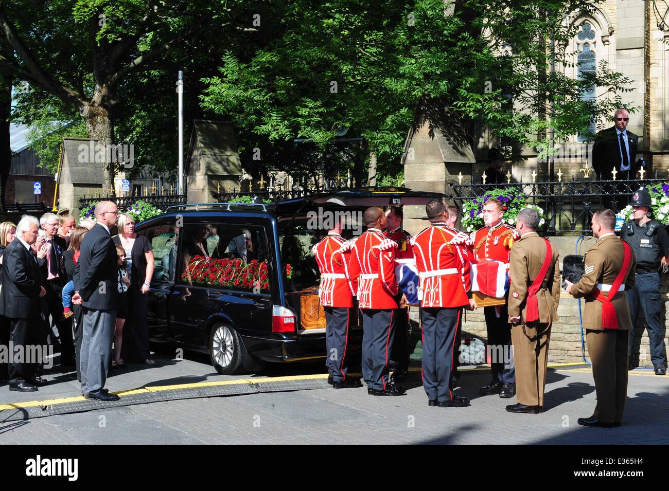 The funeral service of Drummer Lee Rigby. His coffin arrives at Bury ...