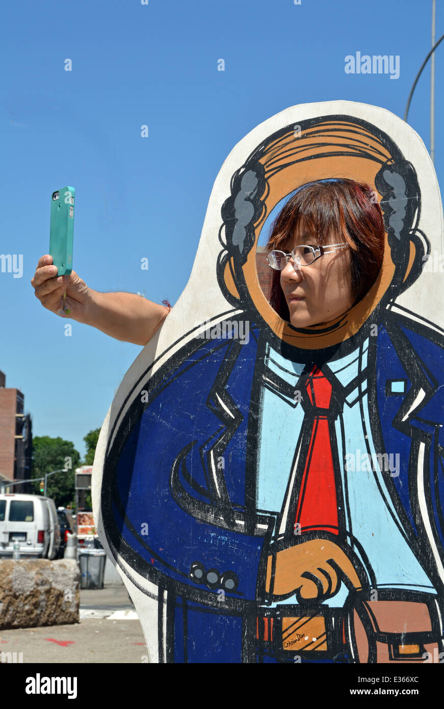 A conceptual artist takes a self portrait in a piece from her ...