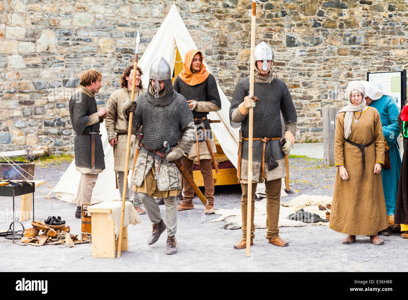 Actors in period costume performing an historical medieval re-enactment ...