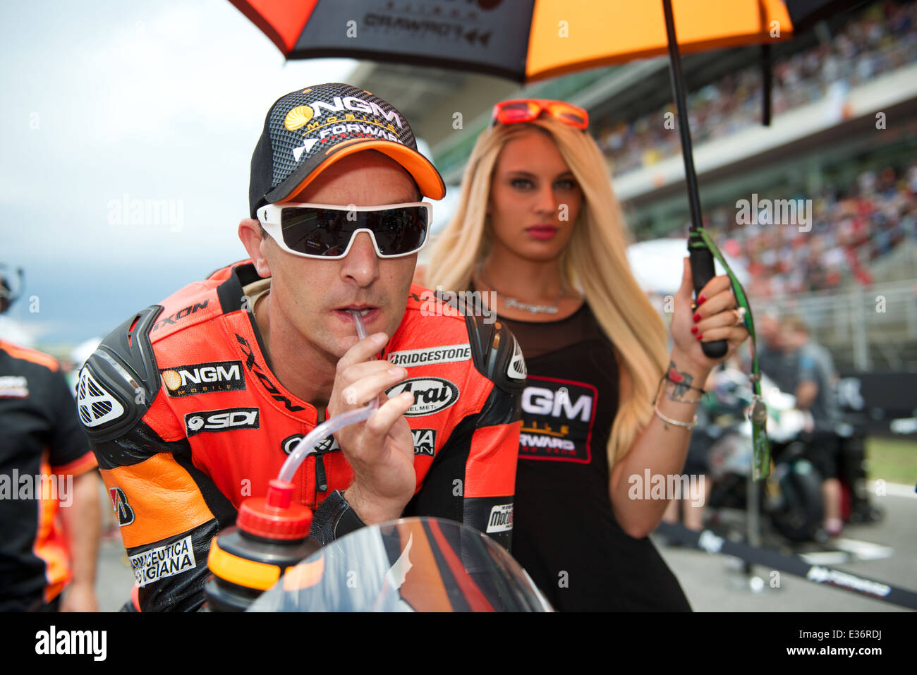 Colin Edwards and his grid girl on the start grid for Round 7 of the ...