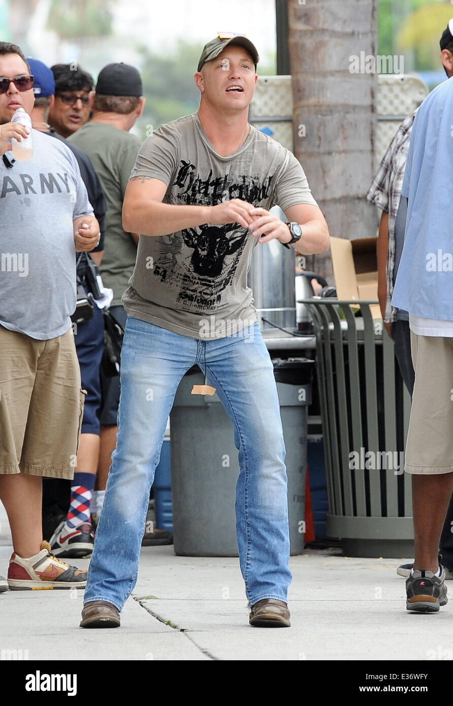 Lane Garrison playing catch with a football during his lunch break on ...