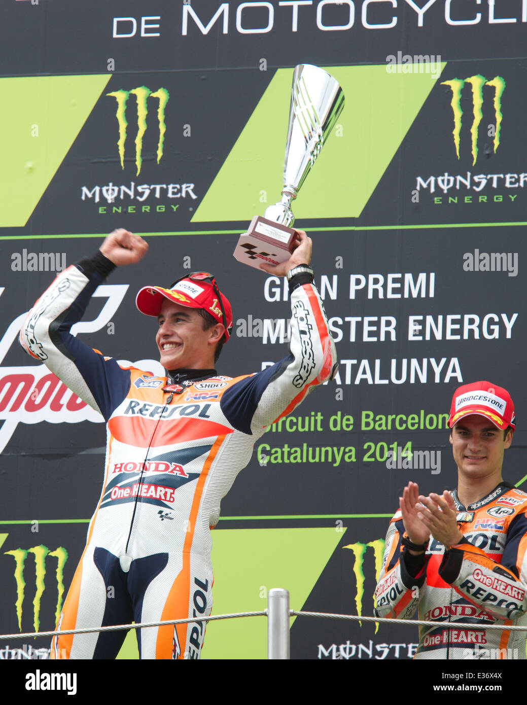 Marc Marques punches the air on the podium after winning Round 7 of the ...