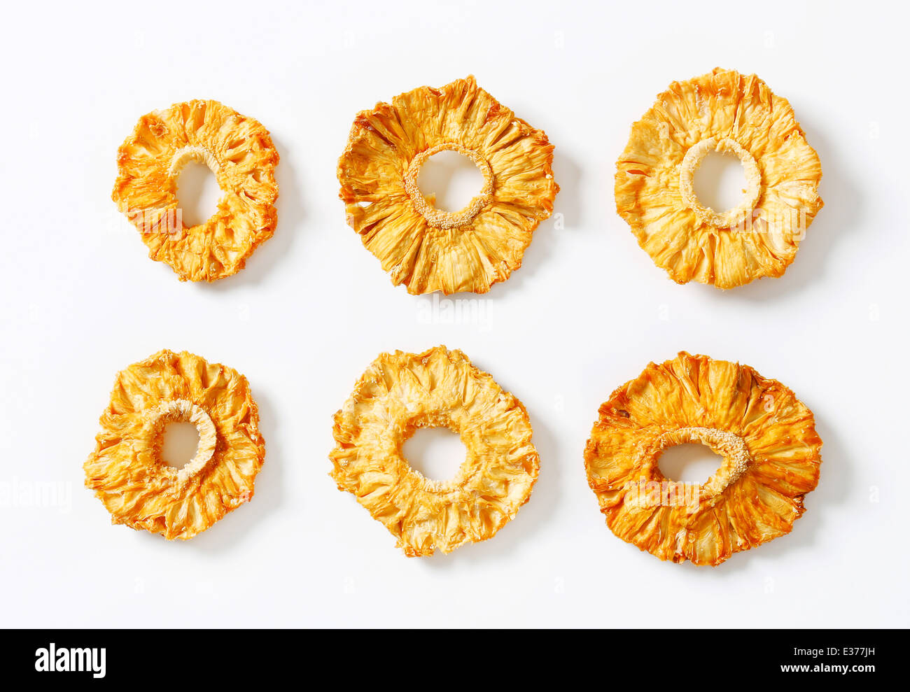 Dried pineapple rings - studio shot Stock Photo - Alamy