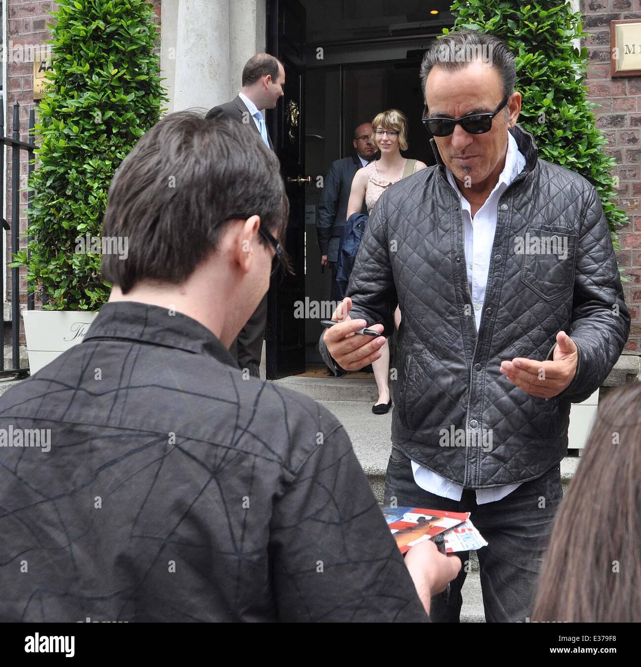 Bruce Springsteen greets fans outside the posh Merrion Hotel Featuring ...