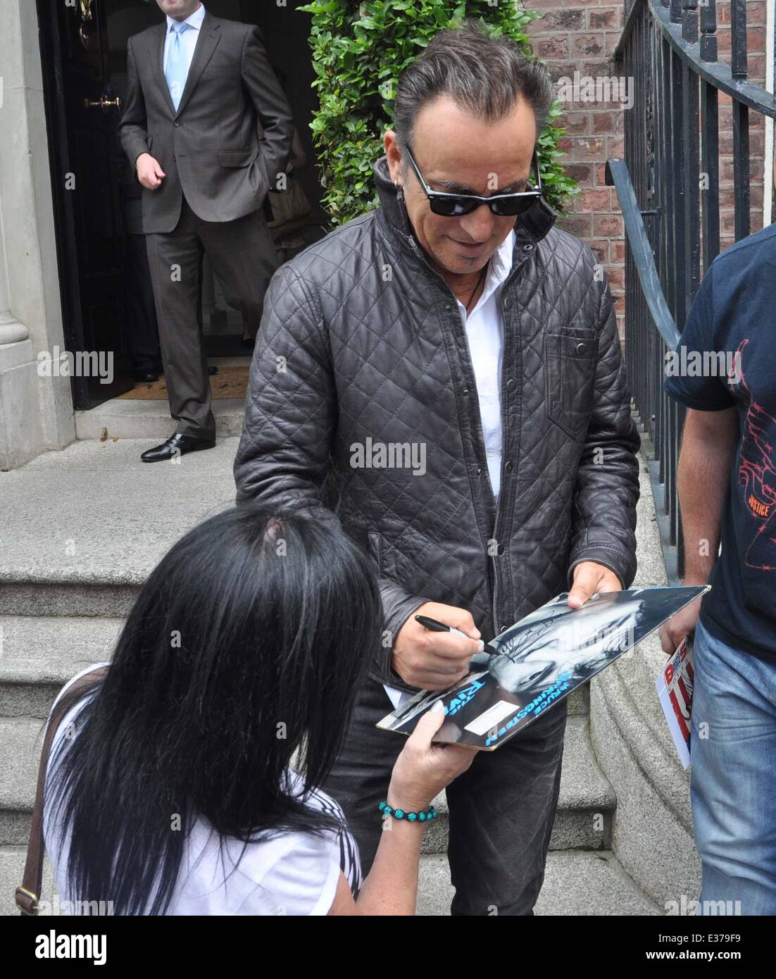 Bruce Springsteen greets fans outside the posh Merrion Hotel Featuring ...