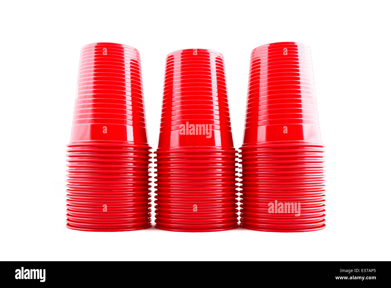Plastic red cups stacks isolated on white background Stock Photo - Alamy