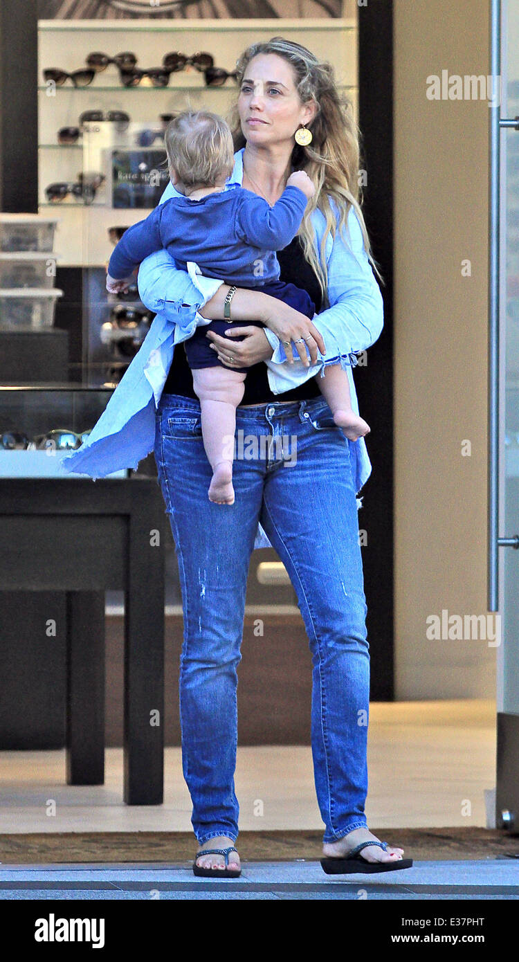 Elizabeth Berkley and her husband Greg Lauren and their son Sky Lauren ...
