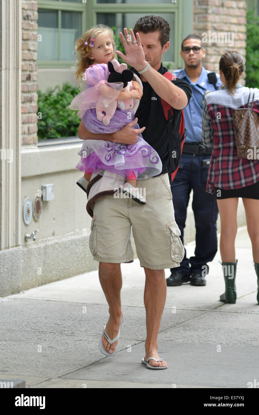 Jason Hoppy, still wearing his wedding band, takes his daughter Bryn ...