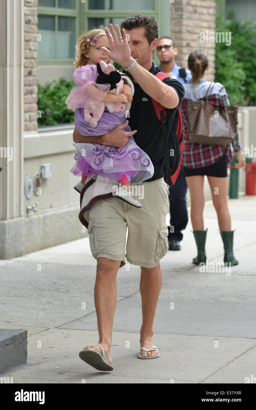 Jason Hoppy, still wearing his wedding band, takes his daughter Bryn ...