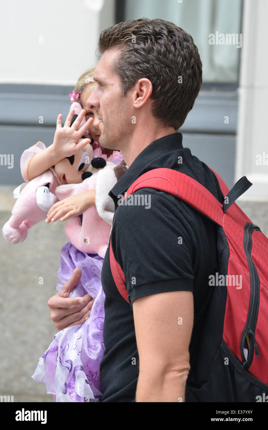 Jason Hoppy, still wearing his wedding band, takes his daughter Bryn ...