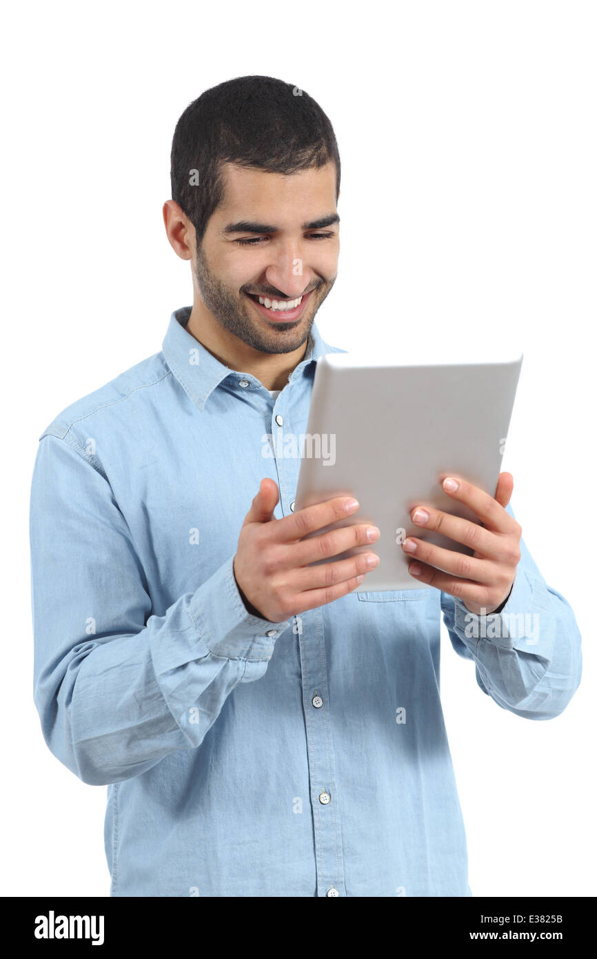 Arab happy casual man holding and reading a tablet reader isolated on a ...