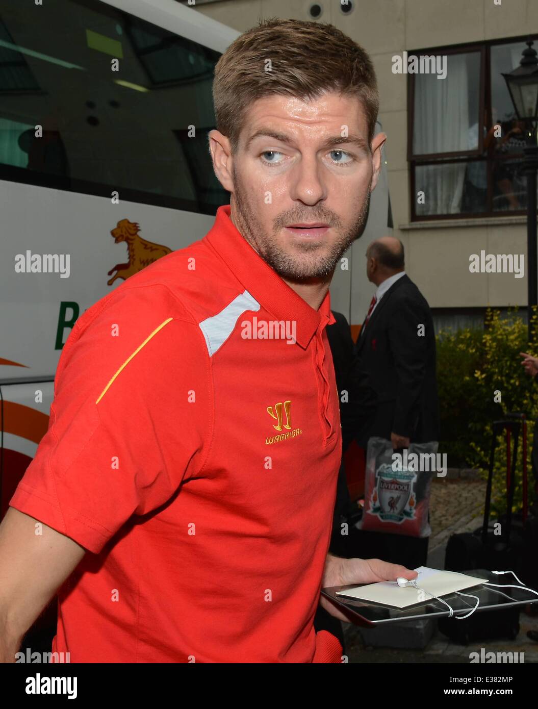 Liverpool F.C. football players, lead by captain Steven Gerrard, arrive ...